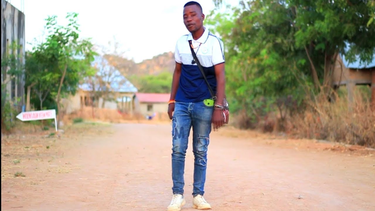 Ng'home madebe harusi kwa kafula official video - YouTube