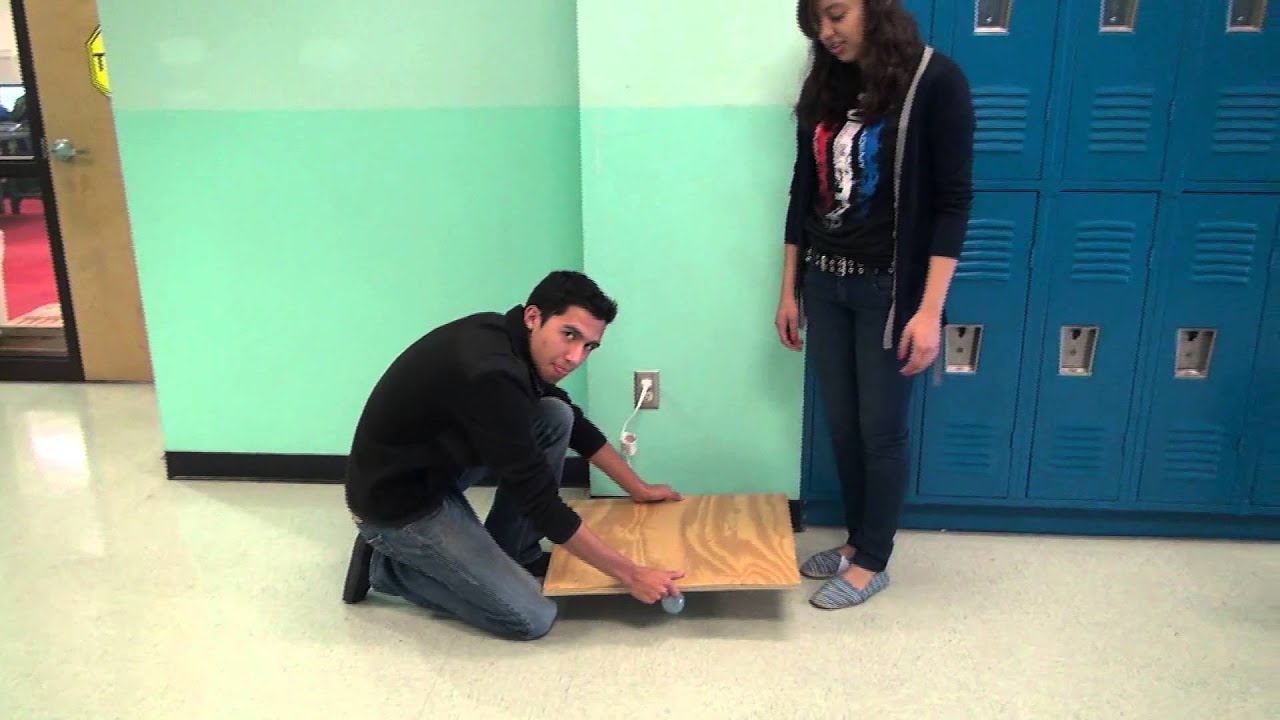 Standing on light bulbs demonstration - YouTube