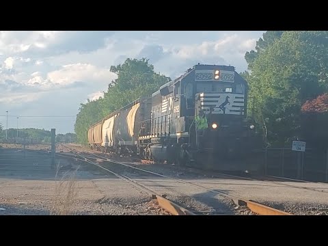 NS 6092 switches with covered hopper cars at CCC Drop yard - YouTube