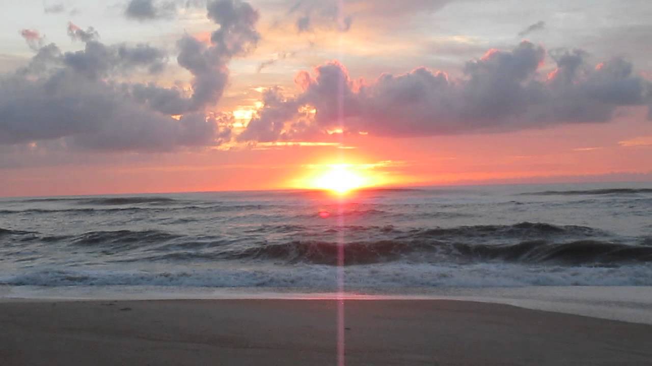 Sunrise over the ocean - YouTube