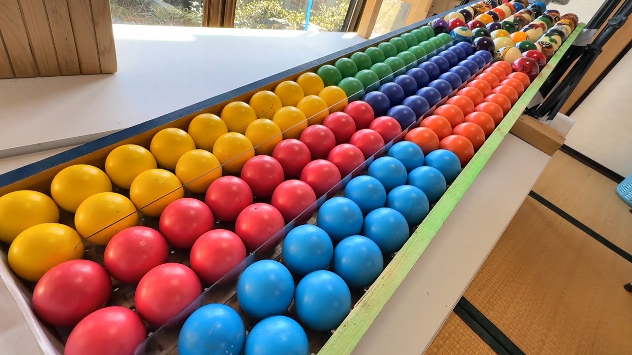 Make a marble run course using a rotating bucket and a colorful ...
