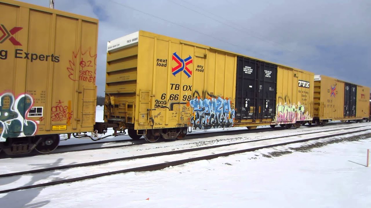 BNSF 5078 and BNSF 7744 ES44DC take BNSF bound freight cars over the CN ...