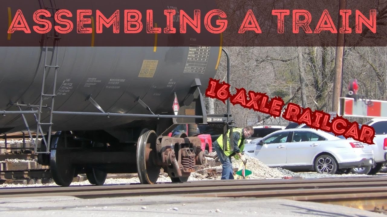 The train crew need to assemble the train before calling it a day. Low ...