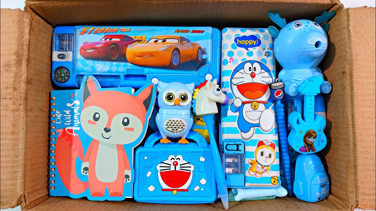 Showing Fancy Blue Stationery 📘, Doraemon Pouch, Notebook, Pen, Eraser ...