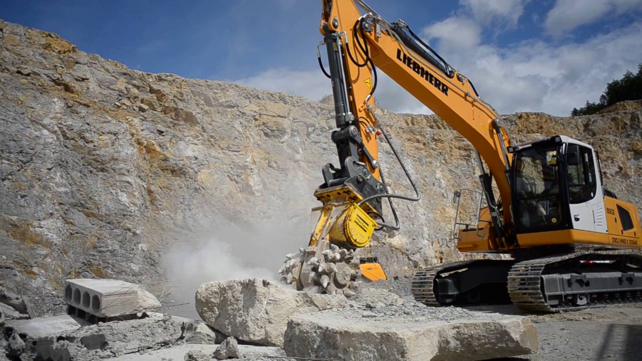 Atlas Copco DC 2100 drum cutter in action - YouTube