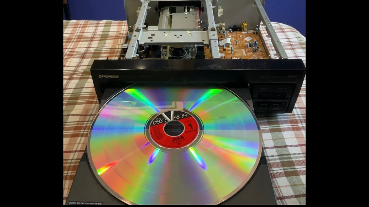 How to open laser disk player - YouTube