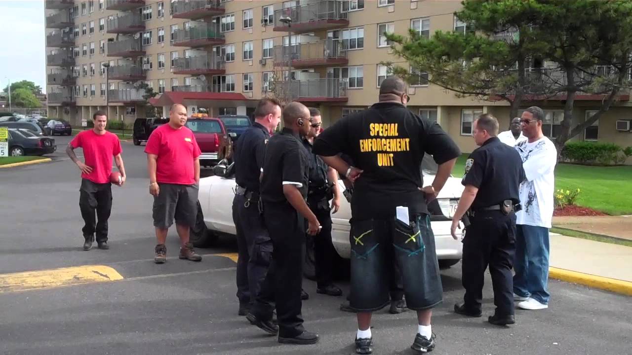 Jennifer Grady Armed Guard being detained by police - YouTube