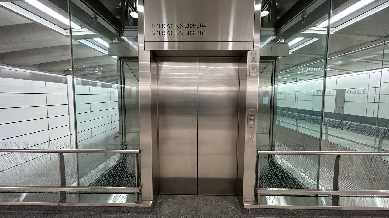 An Elevator And An MTA LIRR Train At Grand Central Madison (Featuring ...