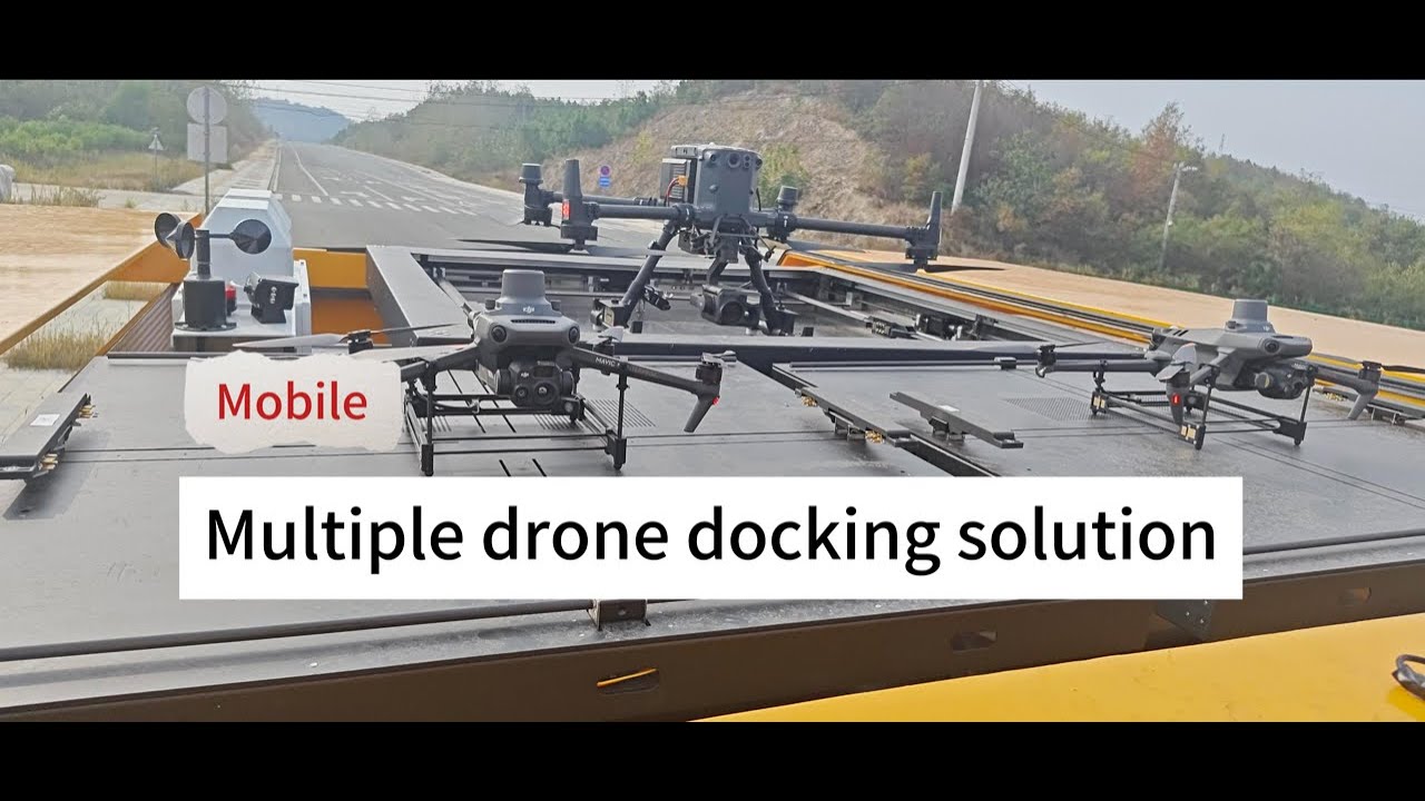 A multi-drone docking system flying demo - YouTube