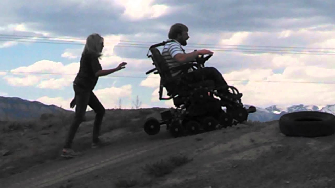 Off Roading Wheelchair up steep hill - YouTube