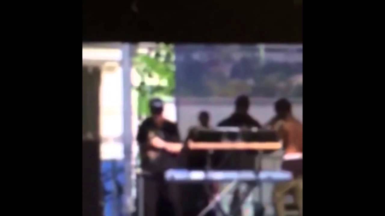 Travis Scott kicks camera man off stage at Summer Jam - YouTube