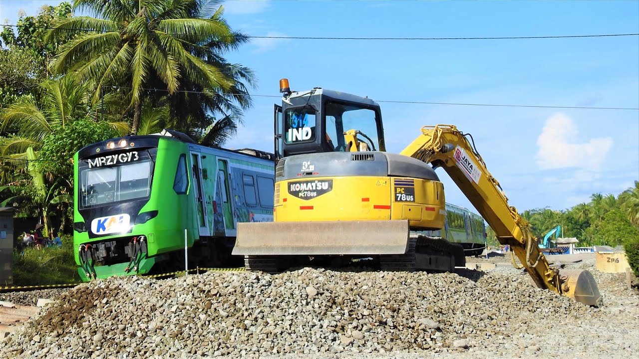 Excavators Trucks Working On The Train Railway Construction - YouTube