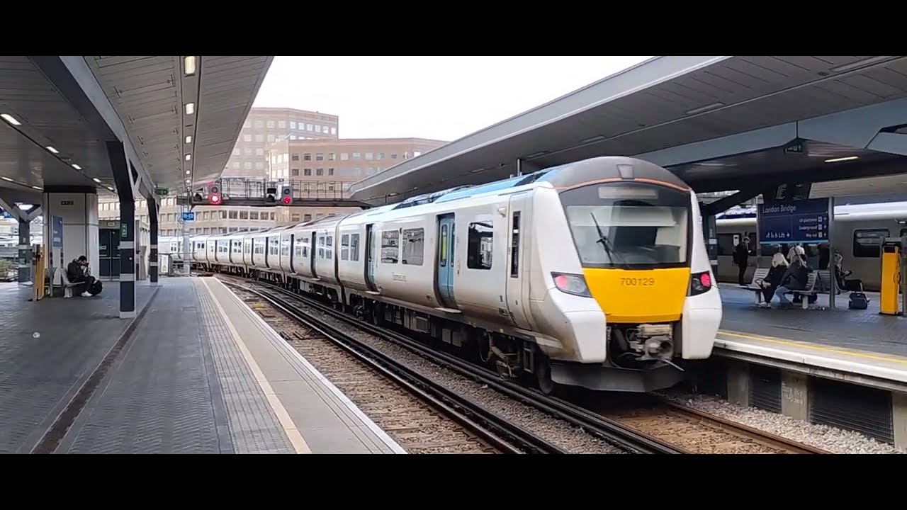 British Rail Class 700 #403129 + Class 707 #707022 leaving London ...