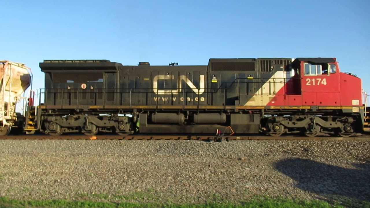 CN 2174 pulls out the empty covered hoppers from Harborlite spur near Vicksburg, MI - YouTube