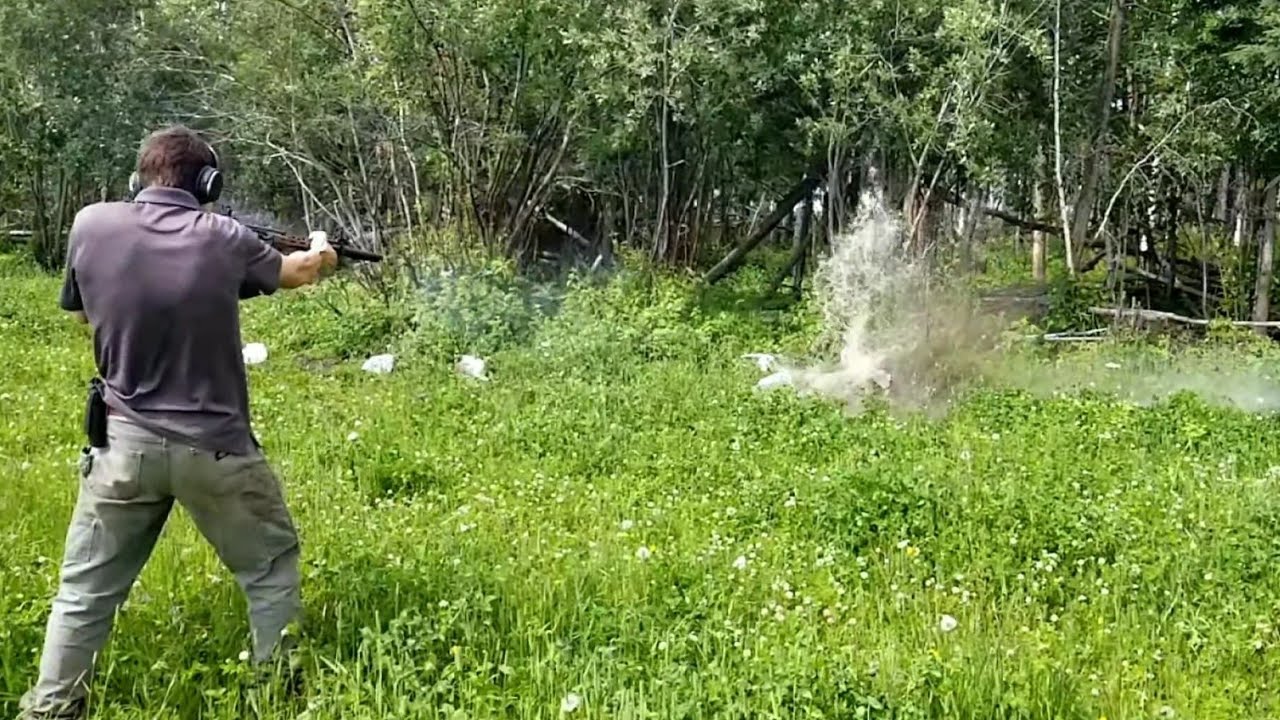 Shootin' things with slugs in slow motion - YouTube