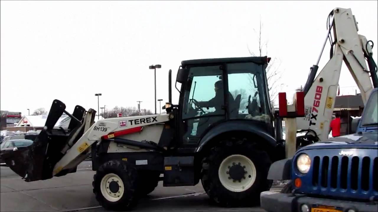 Terex backhoe working - YouTube