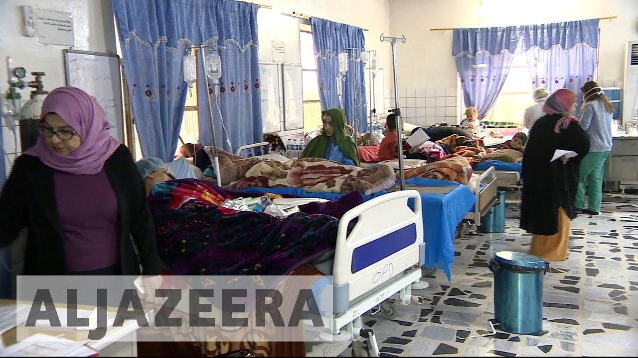Iraqi hospitals struggle with influx of patients from Mosul - YouTube
