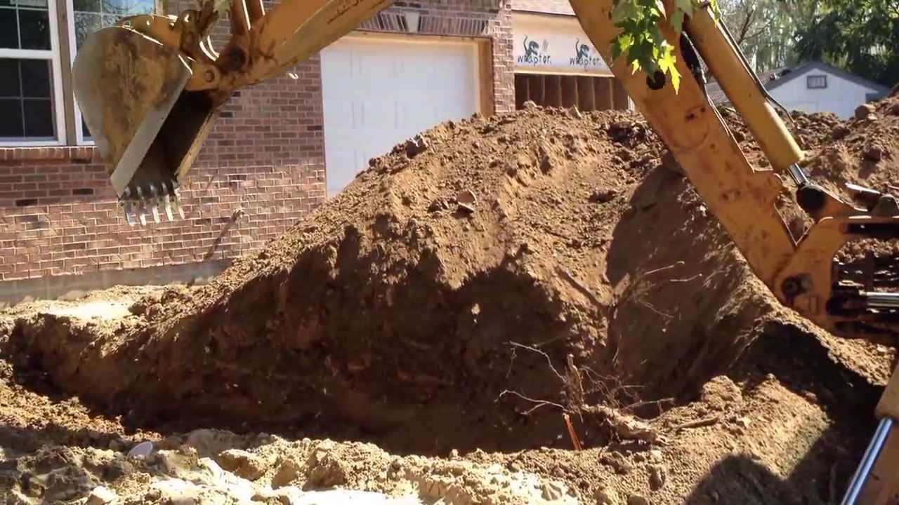 Digging a Sewer Line - YouTube