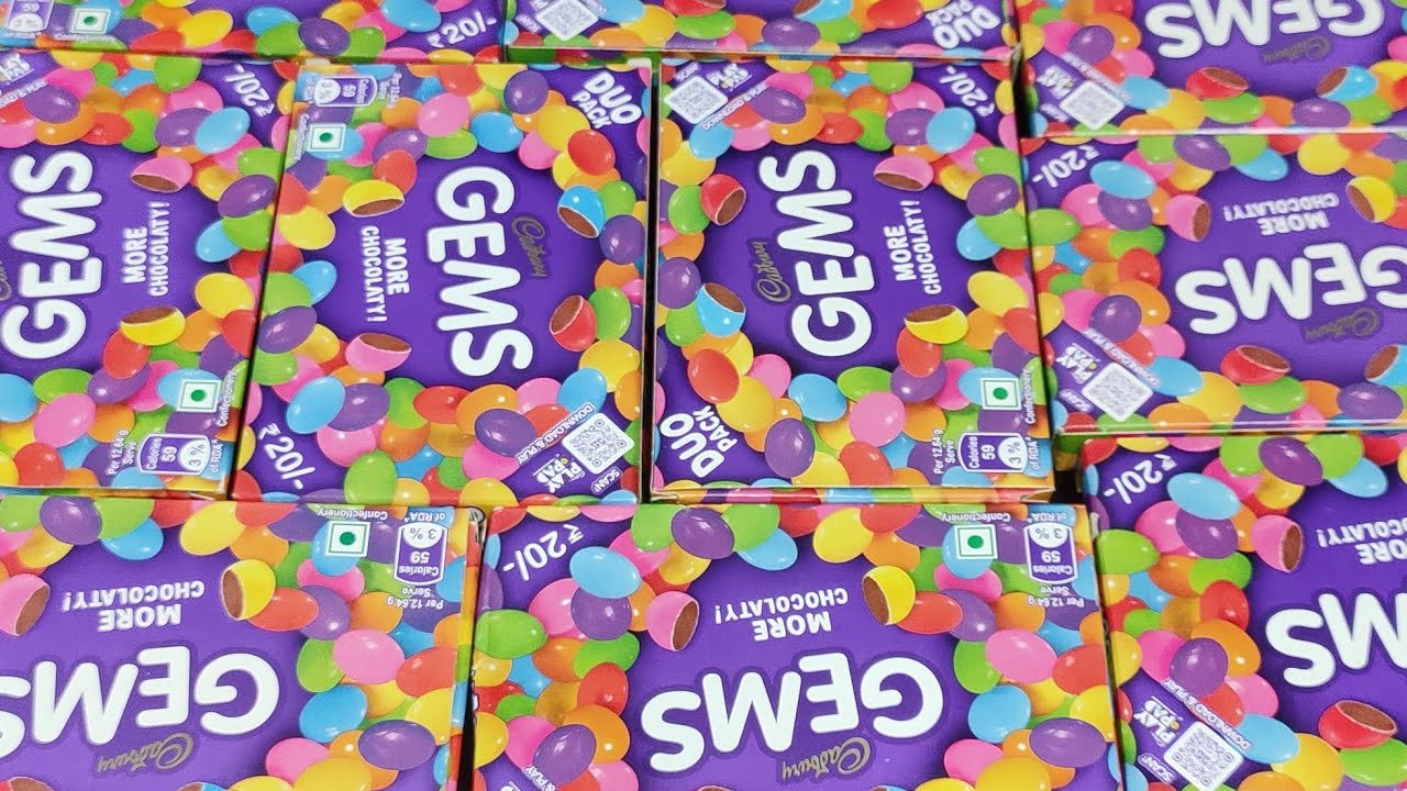 Cadbury gems opening video, lot's of candies, suprise toys, chocolate ...