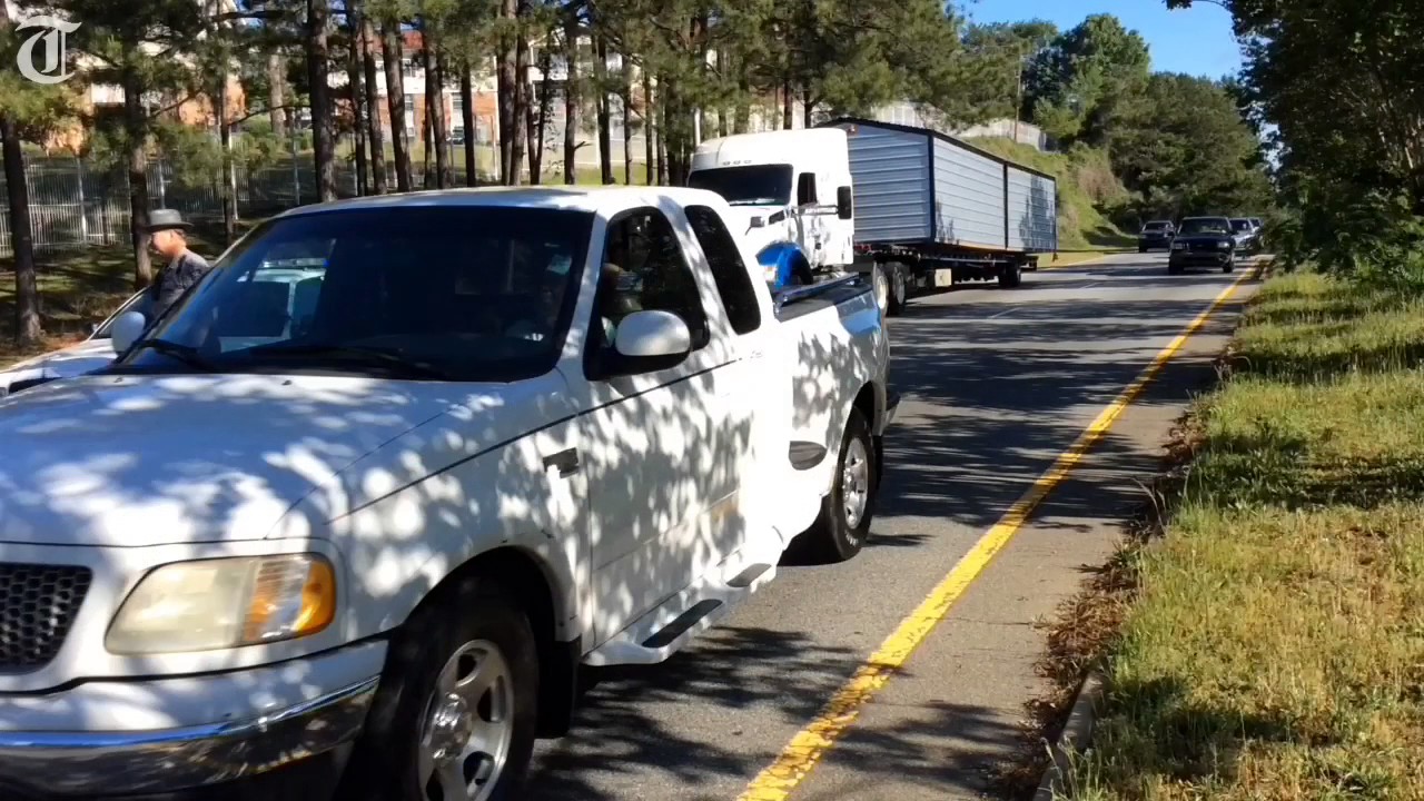 Storage shed falls off trailer on Gray Highway - YouTube
