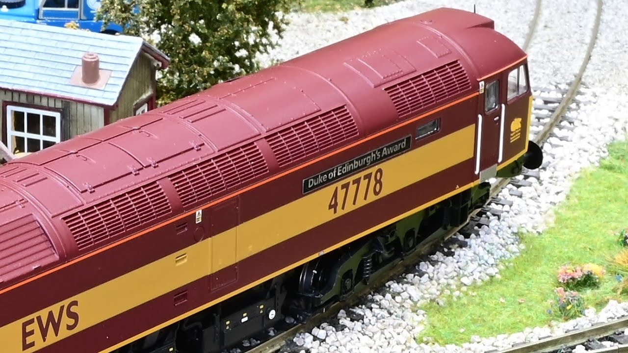 Fitting locomotive name plates to a Class 47. - YouTube