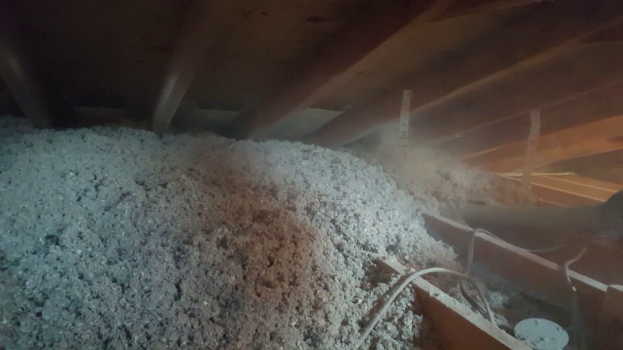 Installation of cellulose insulation after air sealing the attic. - YouTube