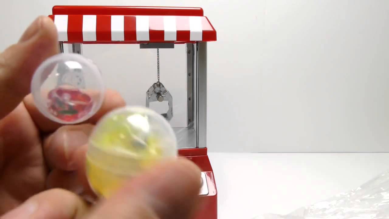 Toys grab candy machine with suprise toys - YouTube