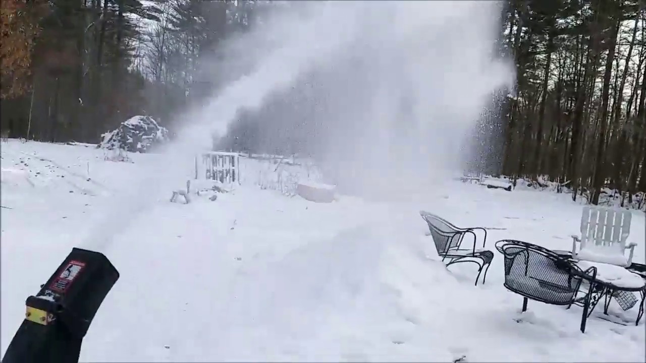 John Deere x310 44 inch Snowthrowing with icy crunchy snow - YouTube