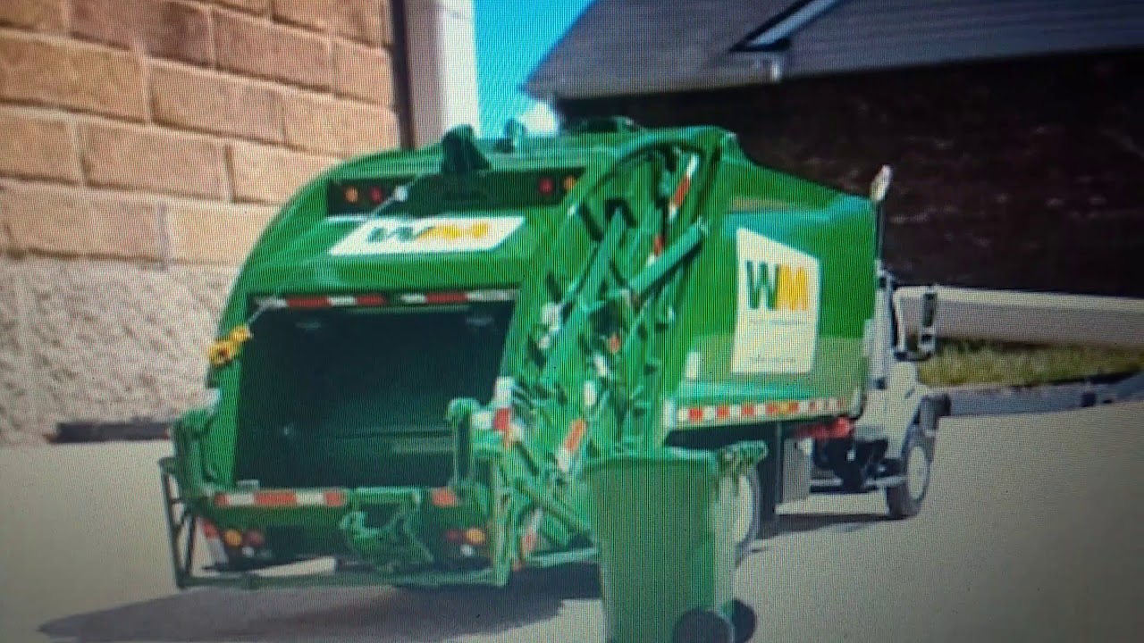 Camión de la basura waste management Freightliner McNeilus escala m2 ...