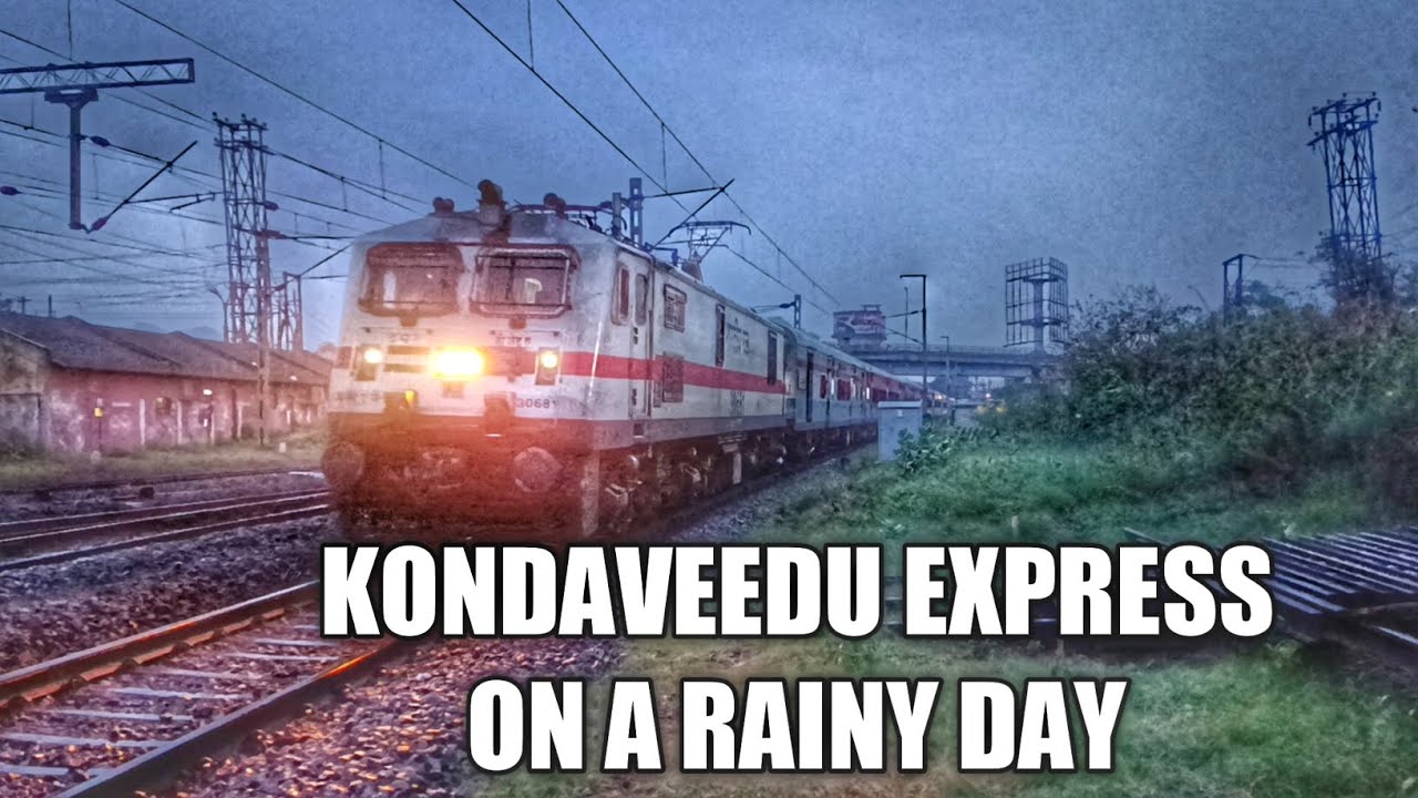 TRAIN IN RAIN 🌧️ || KONDAVEEDU EXPRESS DEPARTING VIJAYAWADA ON A RAINY ...