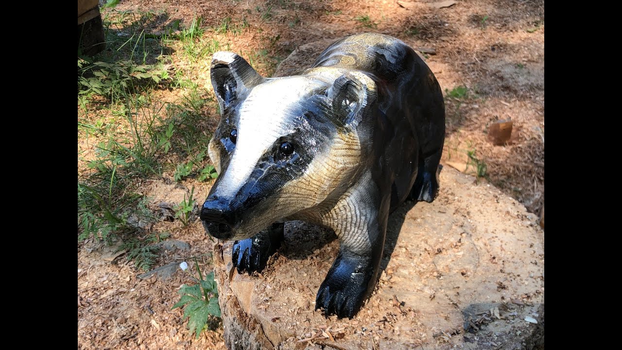 Chainsaw carving a little badger! (High speed) - YouTube