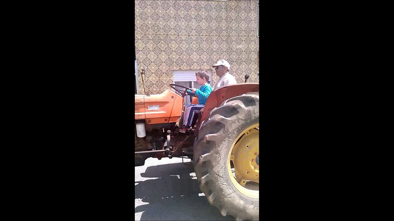 Kid driving farm tractor - part 2 - YouTube