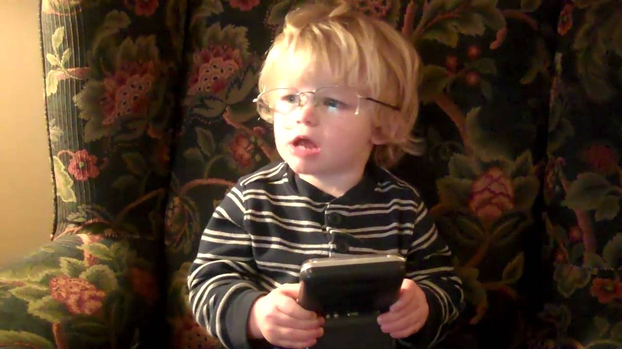 Ollie reading on his Kindle - YouTube