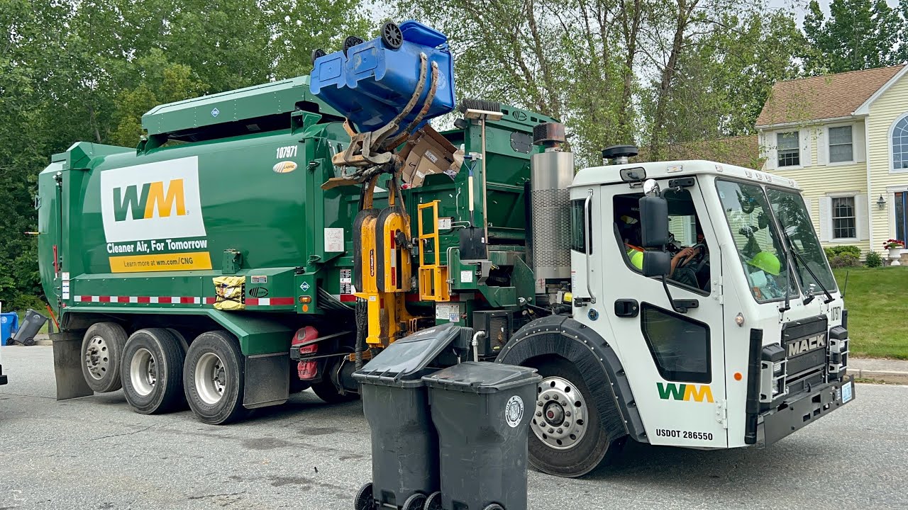 WM’s Brand New Double Dumping Splitbody Garbage Truck - YouTube