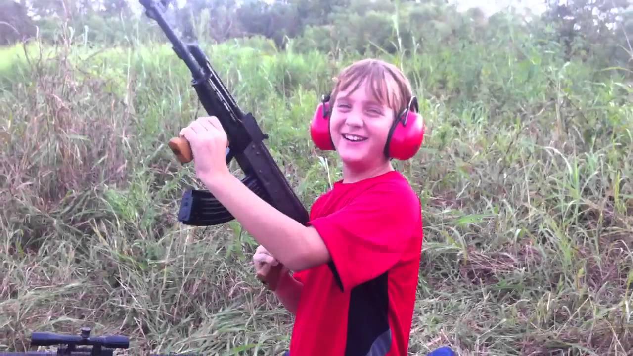 Kid shooting an AK-47 - YouTube