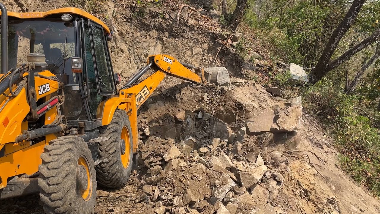 In a Stone Quarry Mountain, The JCB Backhoe Broke Down from Rough ...