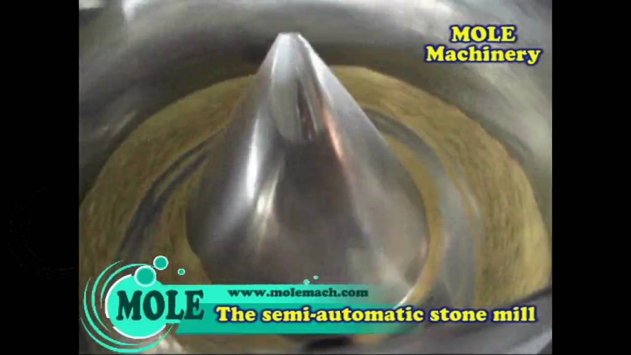 Semi automatic stone mill--MOLE/Molino de piedra semiautomático - YouTube