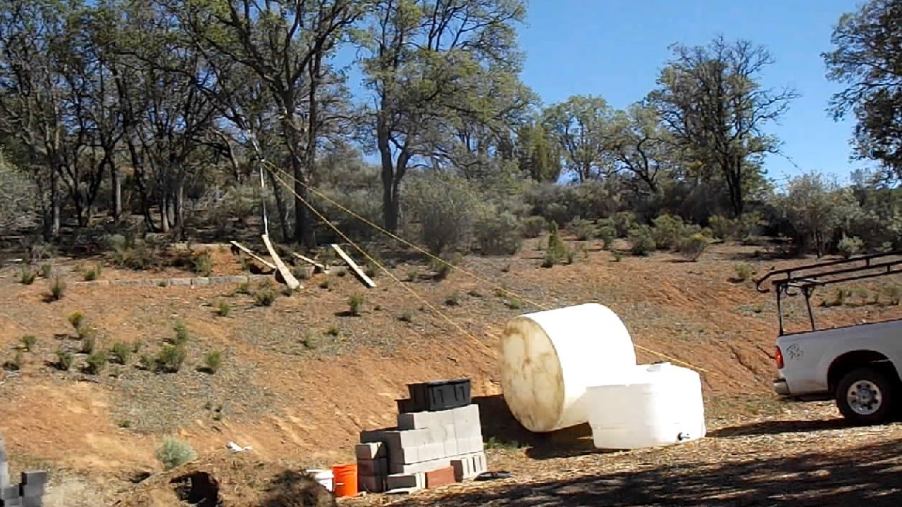 Using a Snatch Block to Move a Plastic Water Tank Uphill Install - YouTube
