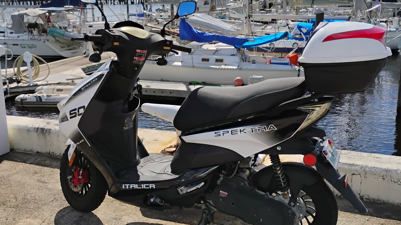 super scooter Ride on The dock of live aboard marina in Florida big ...