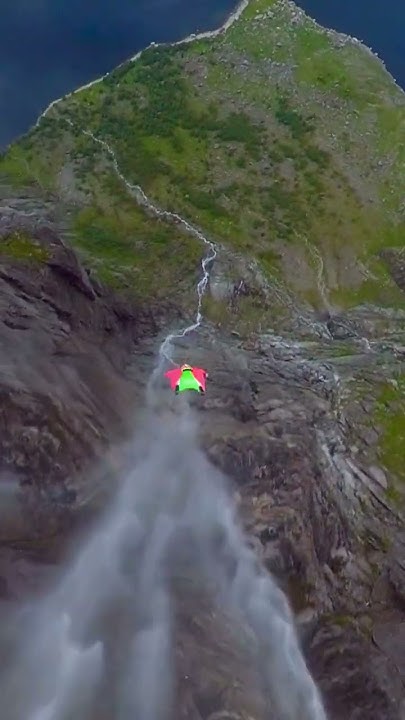 Wingsuit BASE-jumping over waterfalls in Norway #extremesports #worldtravel #norway - YouTube