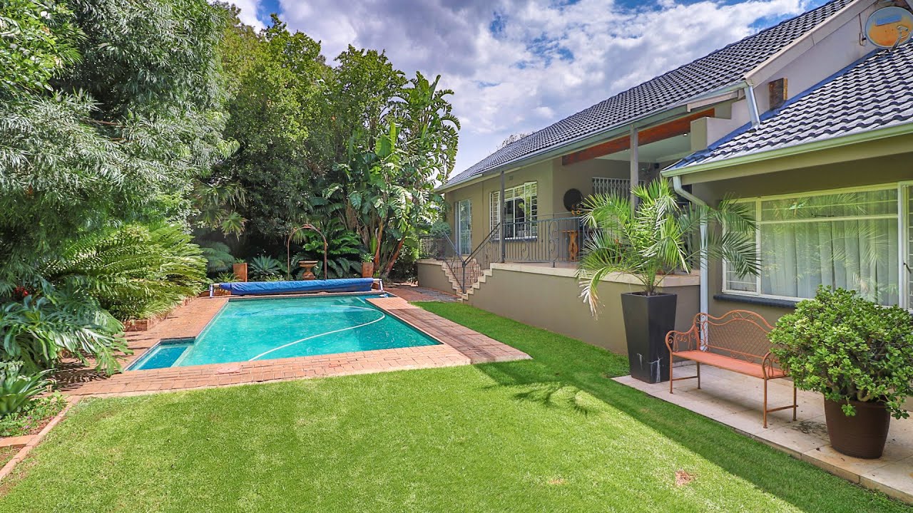 BEAUTIFUL FAMILY HOME IN THE MUCH-SOUGHT-AFTER SECURE BOOMED -OFF AREA ...