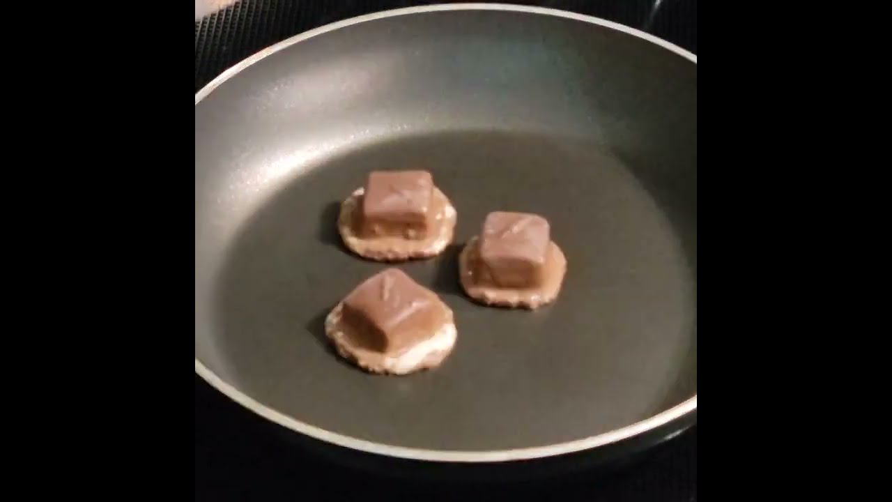Un-melting Mini Snickers (reverse video, 128x) - YouTube