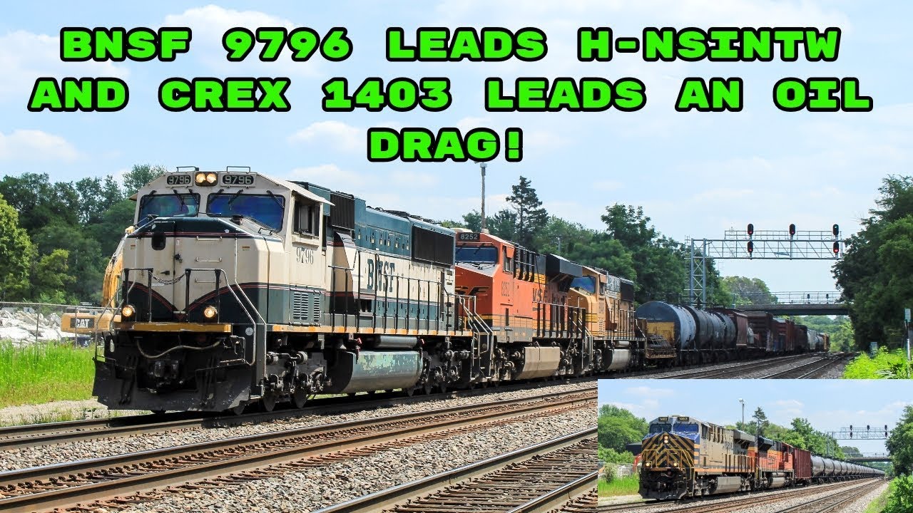 BNSF 9796 (Executive MAC) leads H-NSINTW and CREX 1403 leads an oil ...