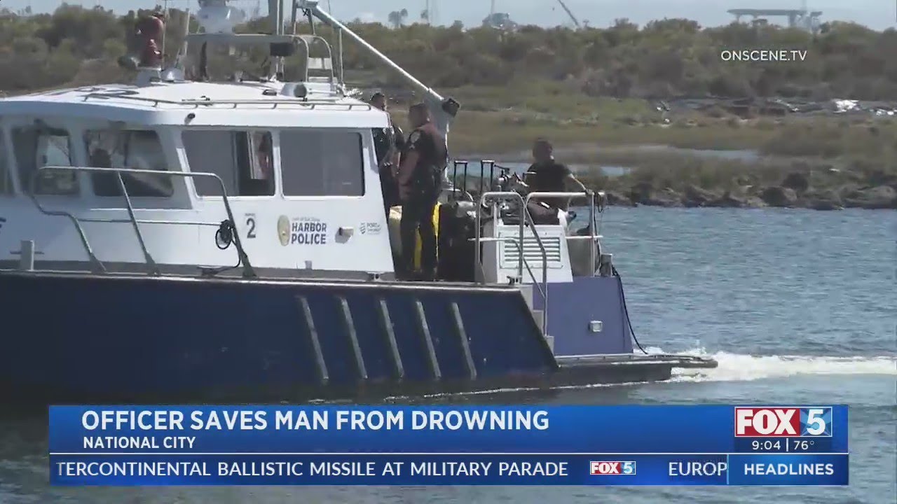 Officer Saves Man From Drowning - YouTube