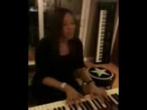 Cassandra singing + playing keys - YouTube