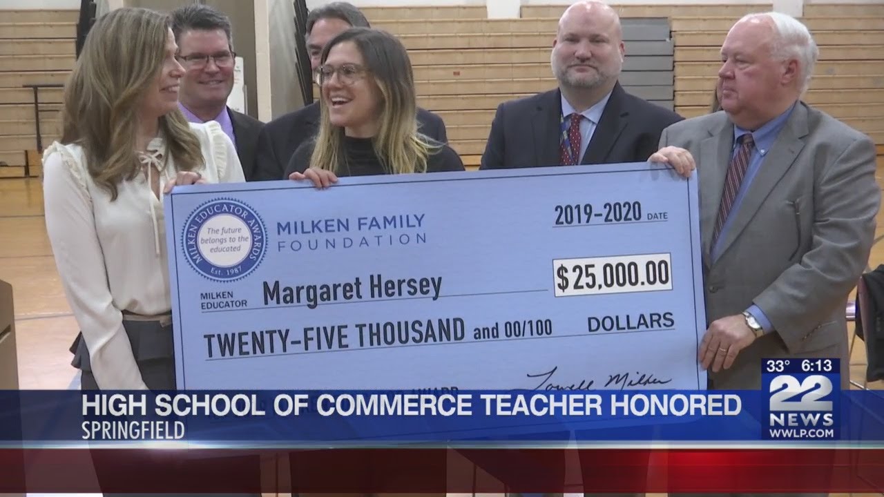 High School of Commerce teacher honored with prestigious award - YouTube