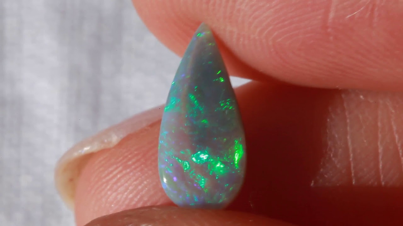 Beautiful Emerald Flash Teardrop Semi Black Opal - YouTube