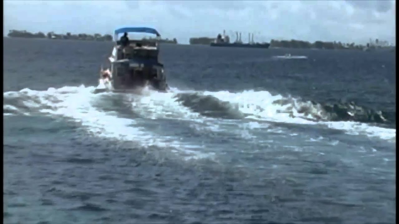 Local Fishing Boat Crossing Under Majuro Bridge - YouTube