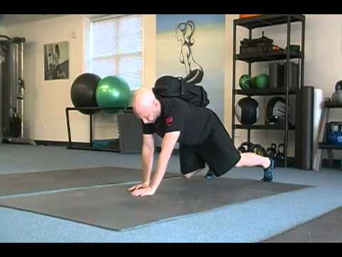 Zig-zag bear crawl, pushup, with sandbag. - YouTube