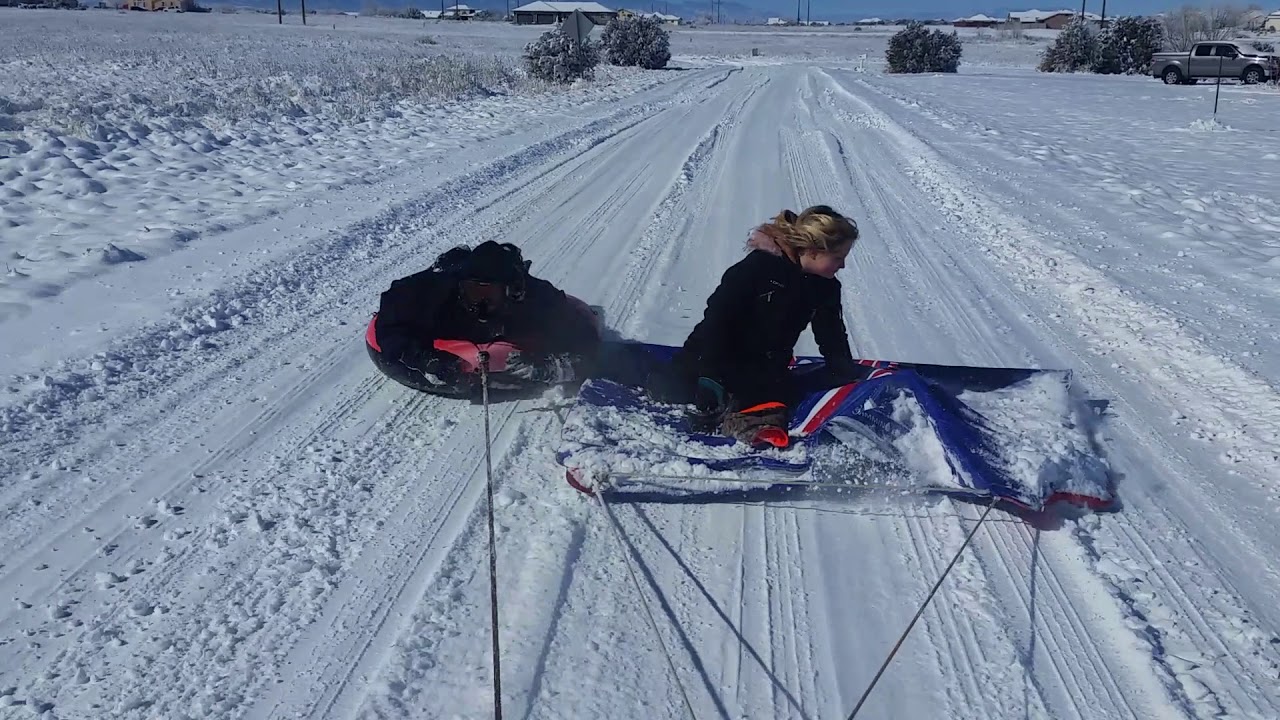 Behind the car sledding - YouTube
